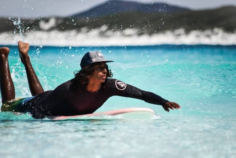 How to Surf: Best First Time Surfing Guide (Beginners)